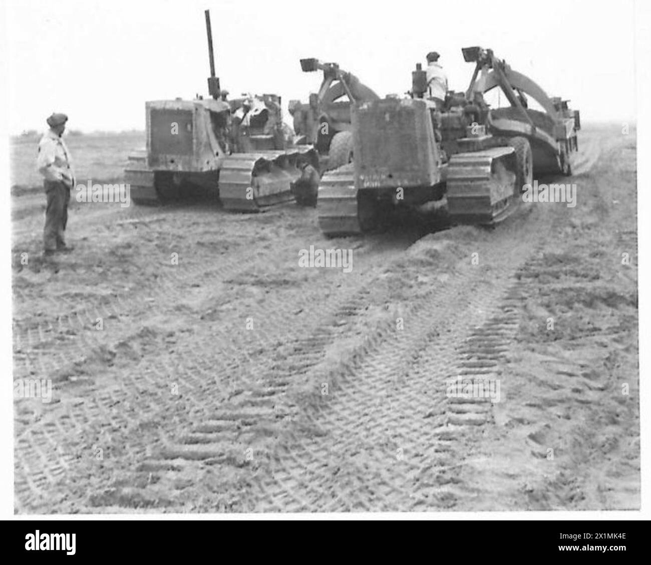 British Army engineers of the Eighth Army prepare an airfield, using ...