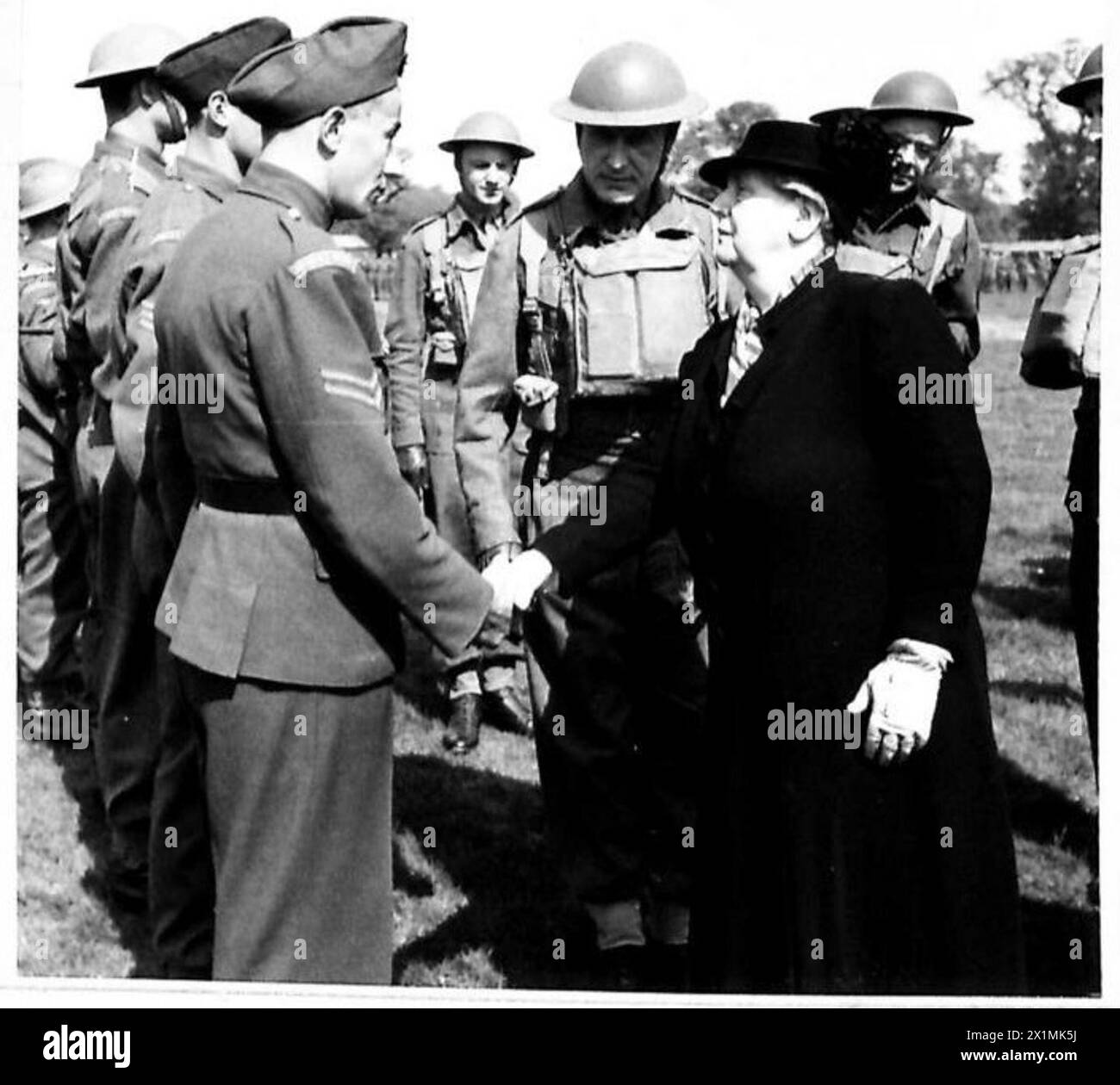 Queen Wilhelmina of Holland inspected Dutch forces and shook hands with ...