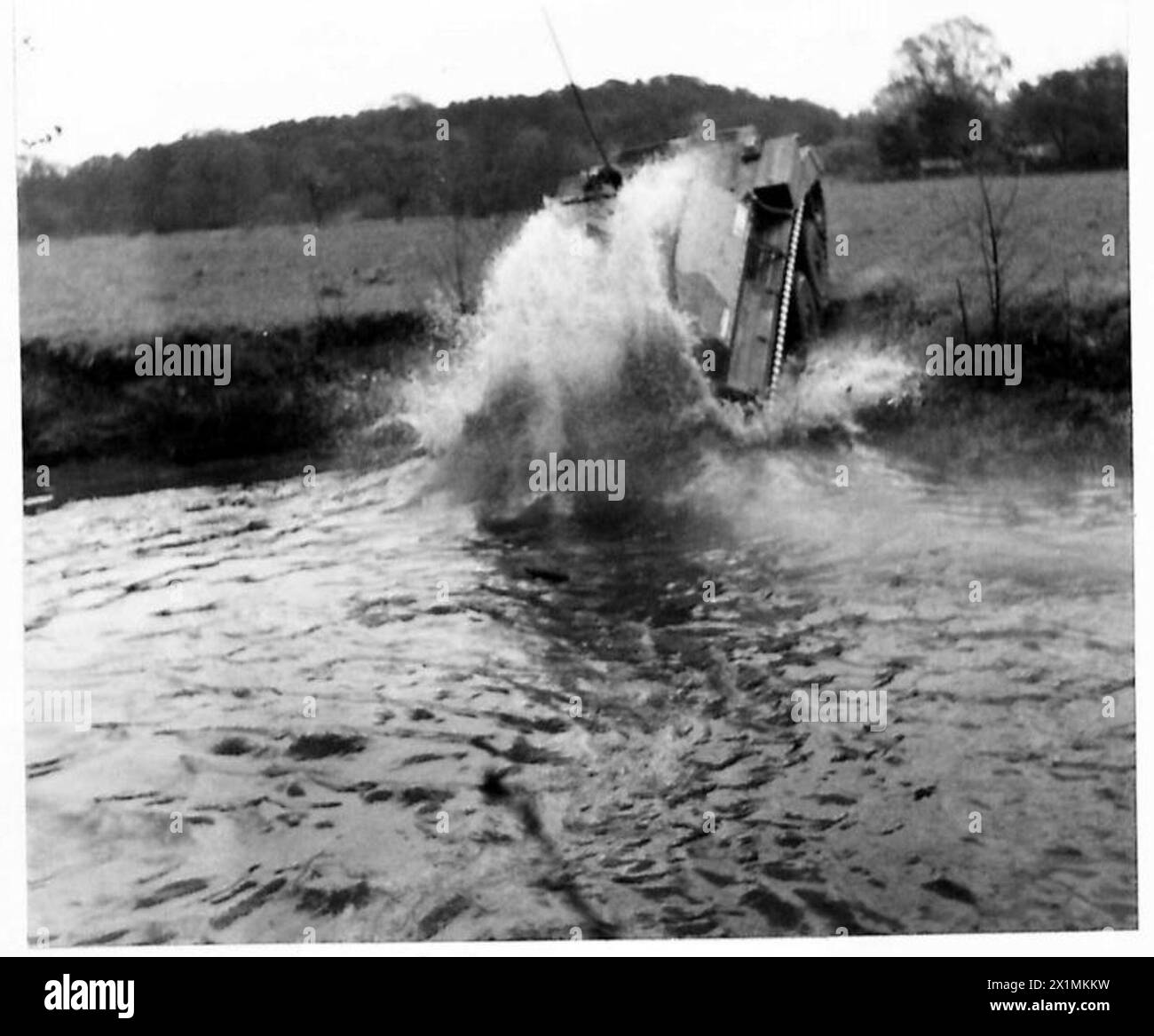 Cruiser tanks cross a river during a British Army exercise. The ...