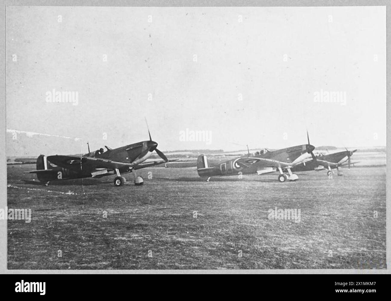THE BATTLE OF BRITAIN 1940 - A section of Spitfires ready to take off ...