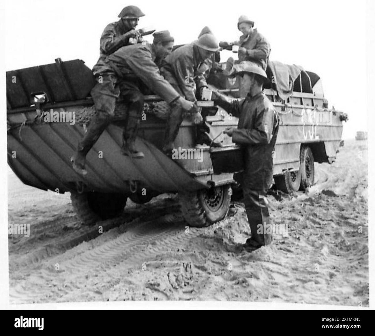 Driver J. Peters serves tea to fellow drivers W. Rowley, E.W. Kelly, E ...