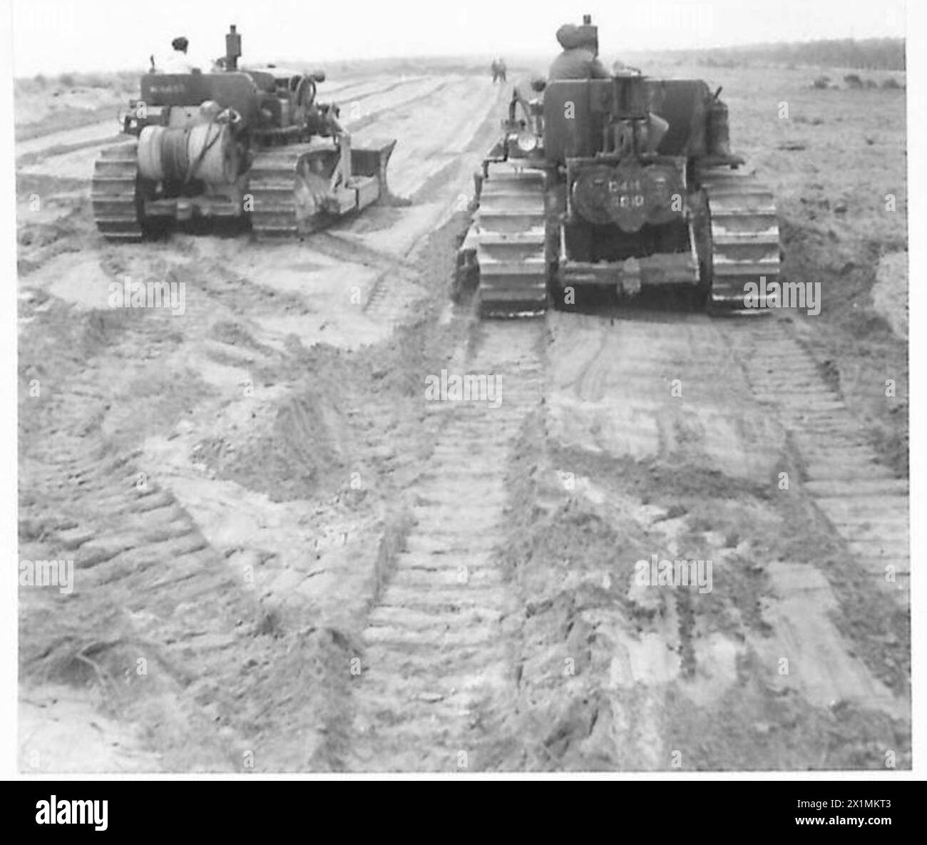 EIGHTH ARMY : AN AIRFIELD UNDER PREPARATION - Criss-crossing the site ...