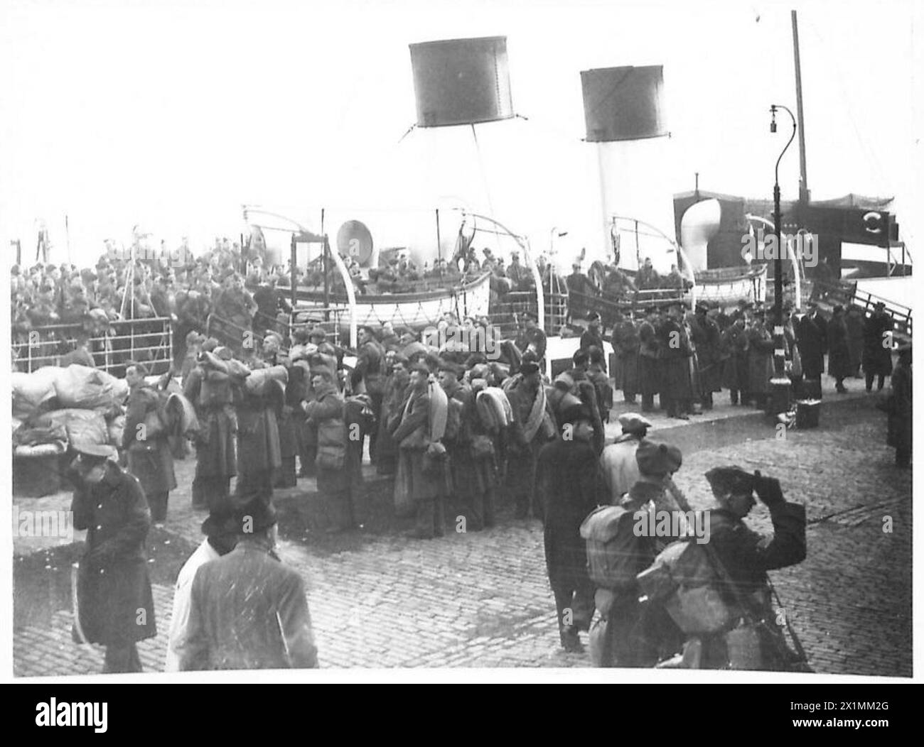 The first Canadian contingent arrives at Greenock quay, illustrating ...