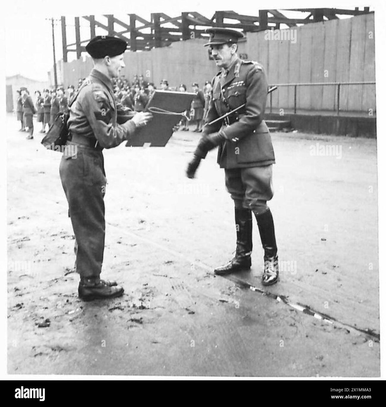 Brigadier Hansen V.C. presents a shamrock certificate to Lance Sergeant ...