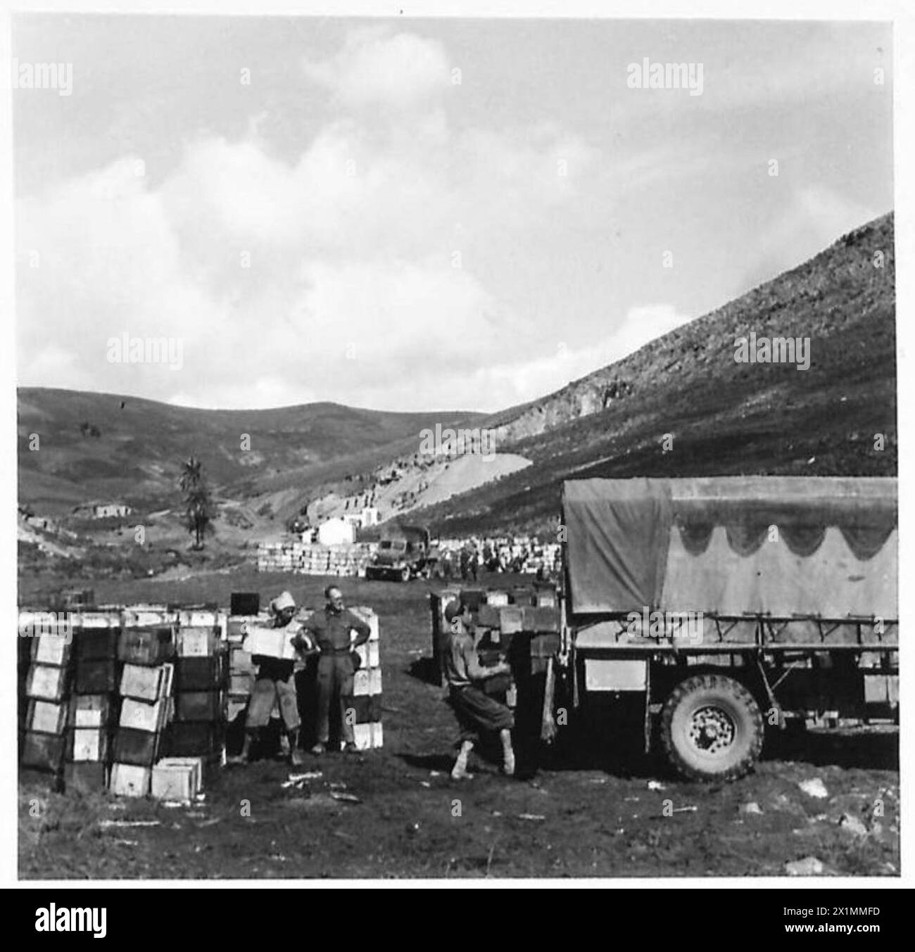 COMPO RATION DUMP - An NCO supervising the loading of '14 men' Compo ...