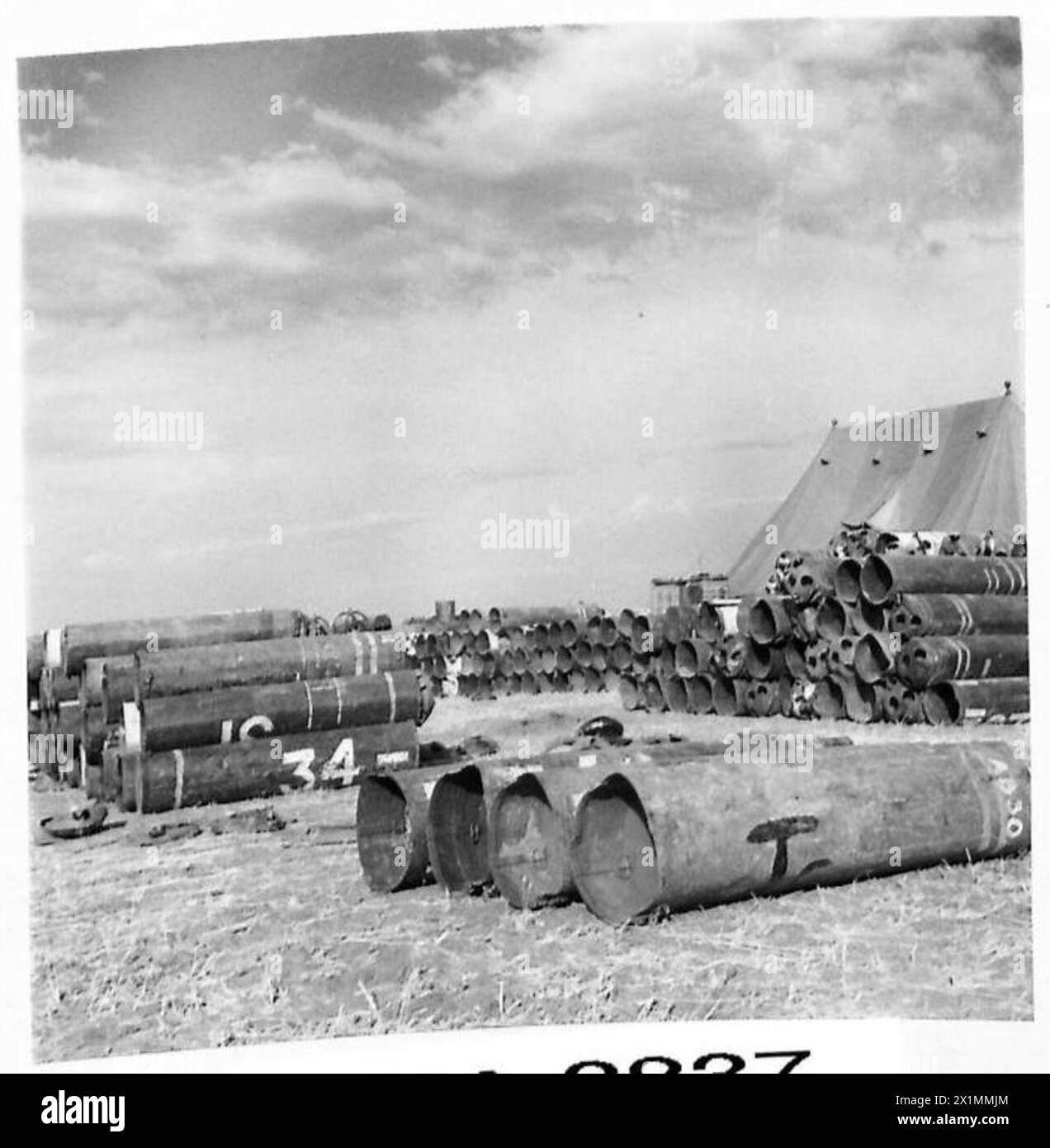 PREPARING FOR A PARATROOP EXERCISE - View of a container dump, where ...