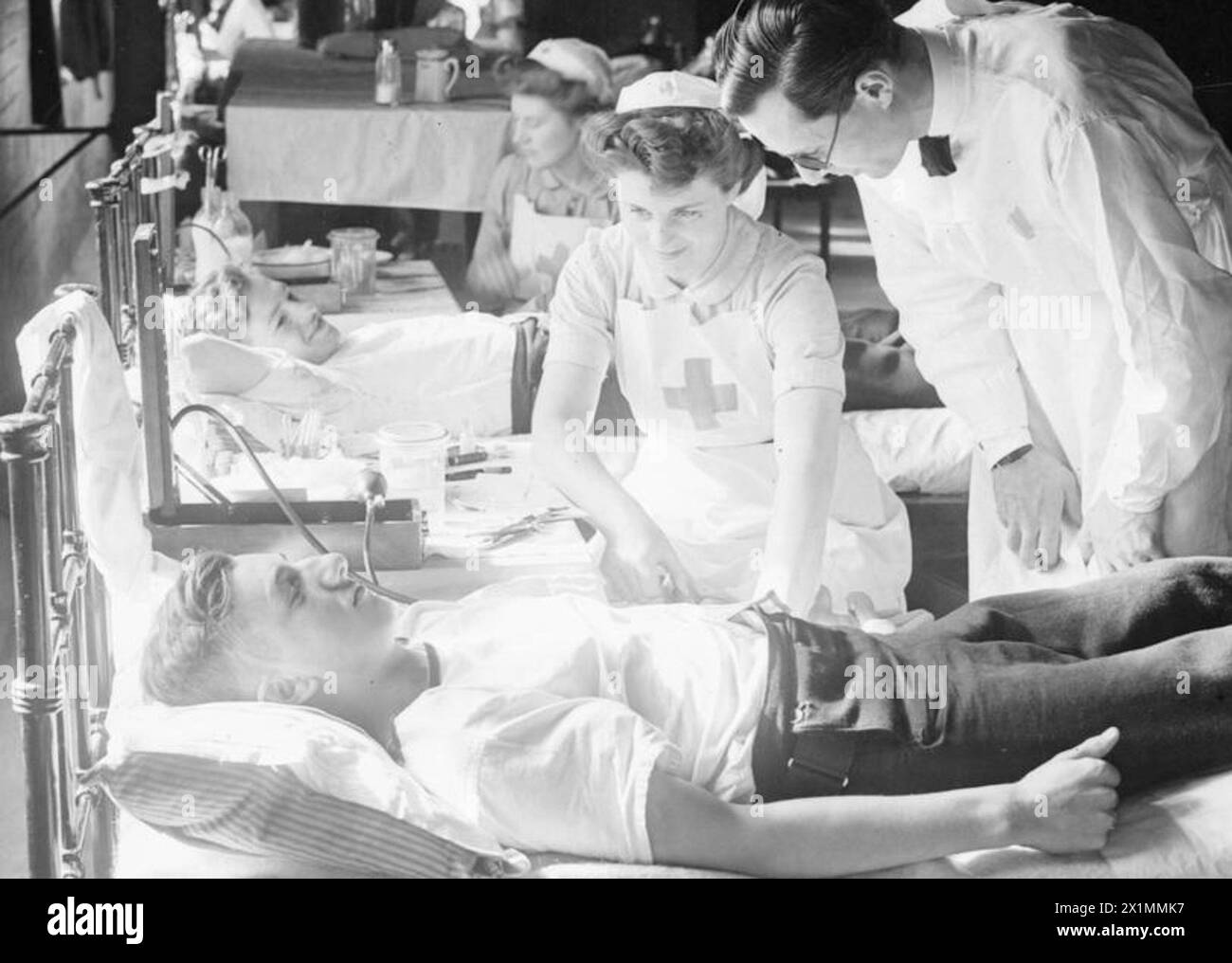 THE ROYAL NAVY DURING THE SECOND WORLD WAR - The doctor inspecting a ...