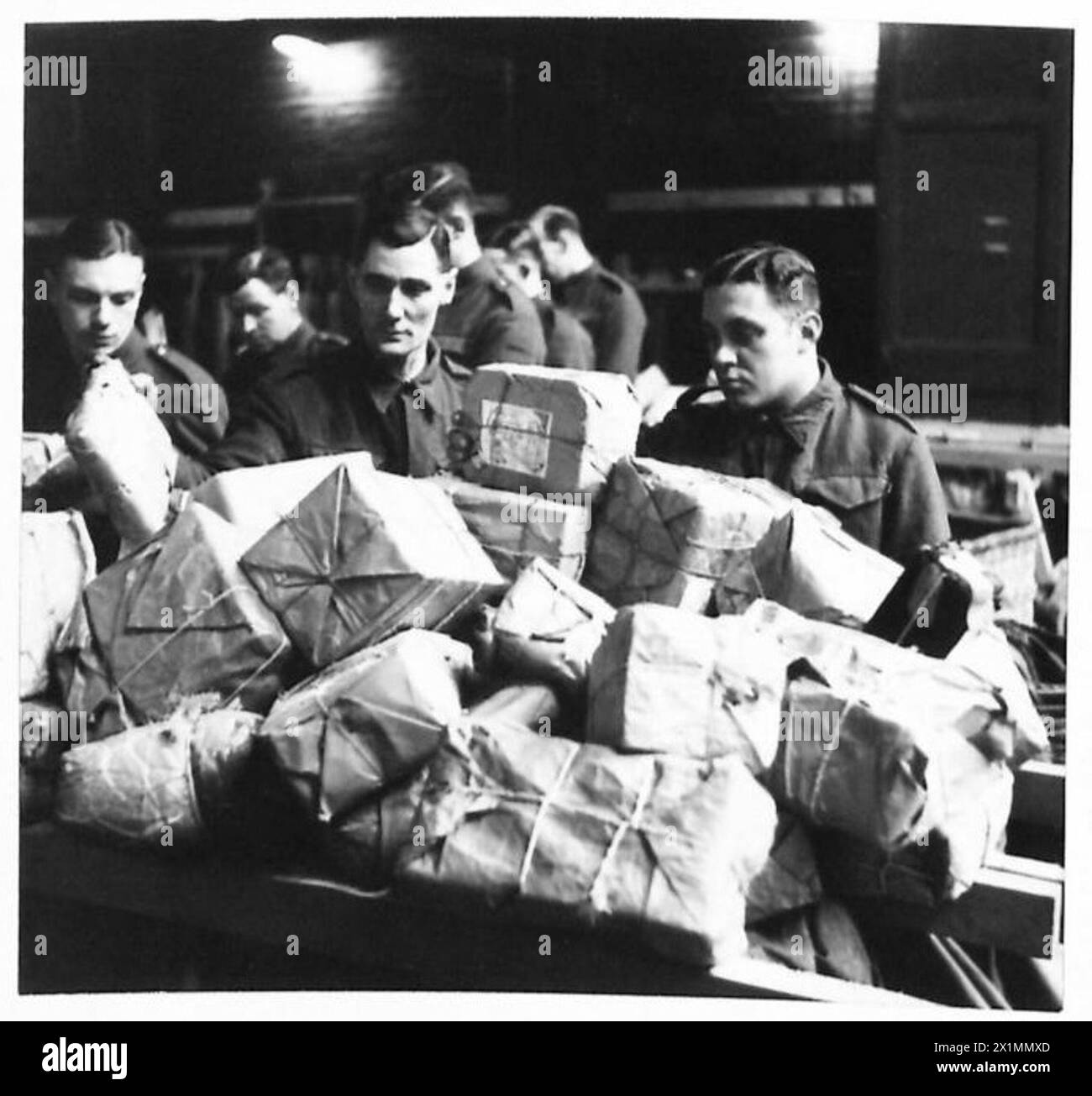 THE ARMY POSTAL SERVICE - A close up of the men of the Army Postal ...