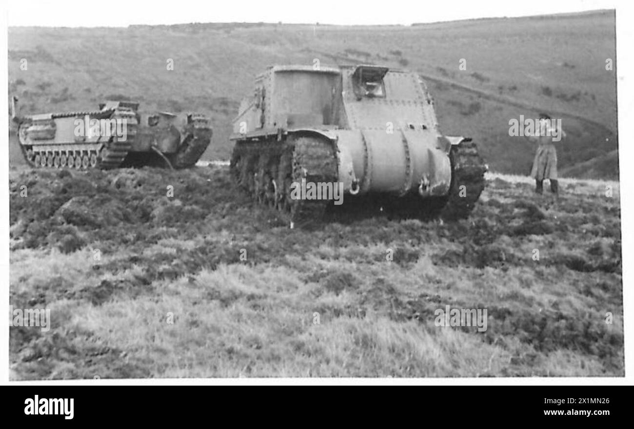 RECOVERING A CHURCHILL TANK - The damaged Churchill is towed clear by ...