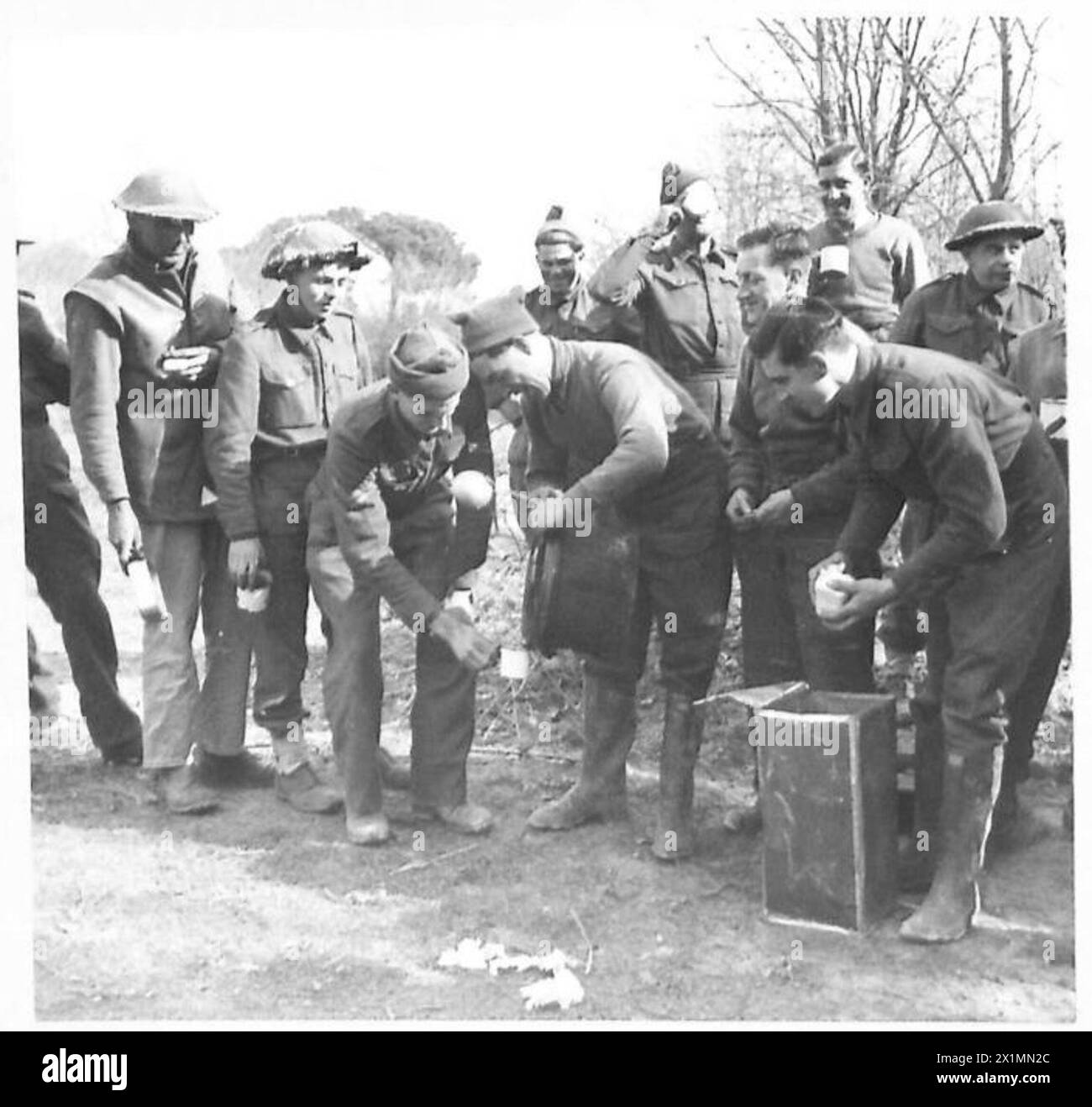 Men of a regiment receive tea as part of daily routines in the Fifth ...