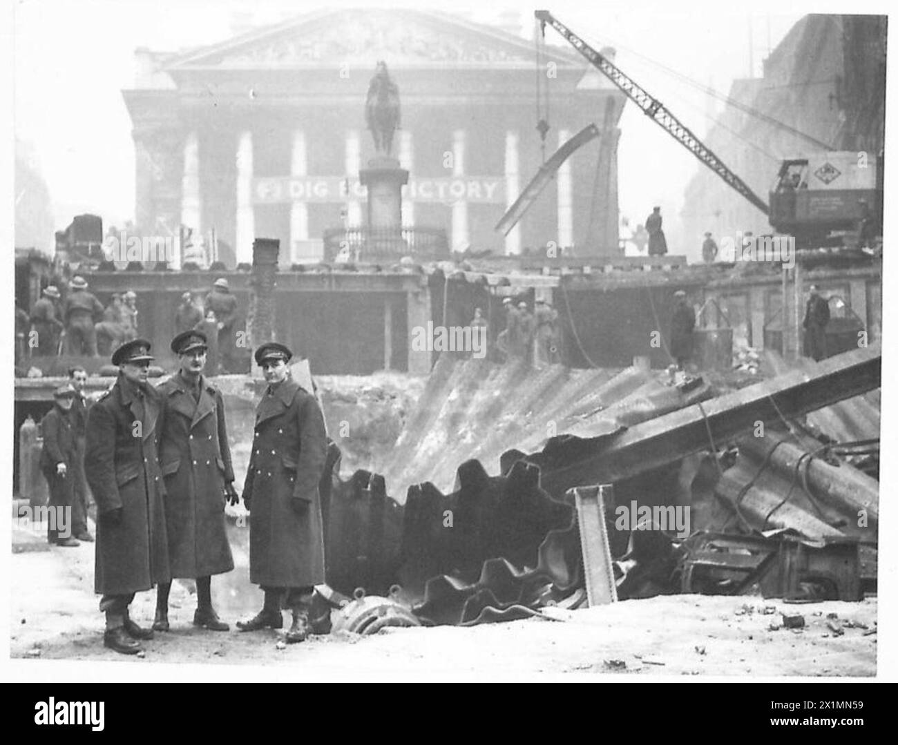 R.E.s CLEAR UP BOMB DAMAGE - This set of pictures show men of the Royal ...