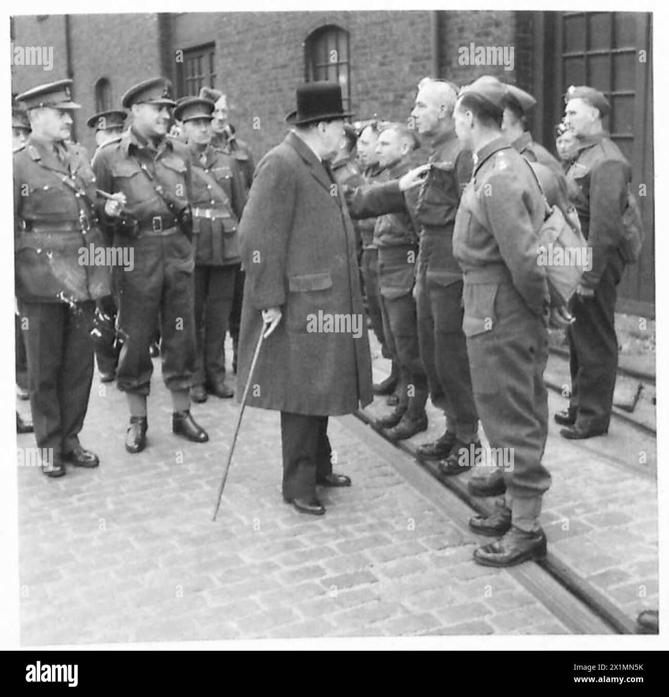 THE PRIME MINISTER VISIT LONDON'S DOCKS - Mr. Winston Churchill asking ...
