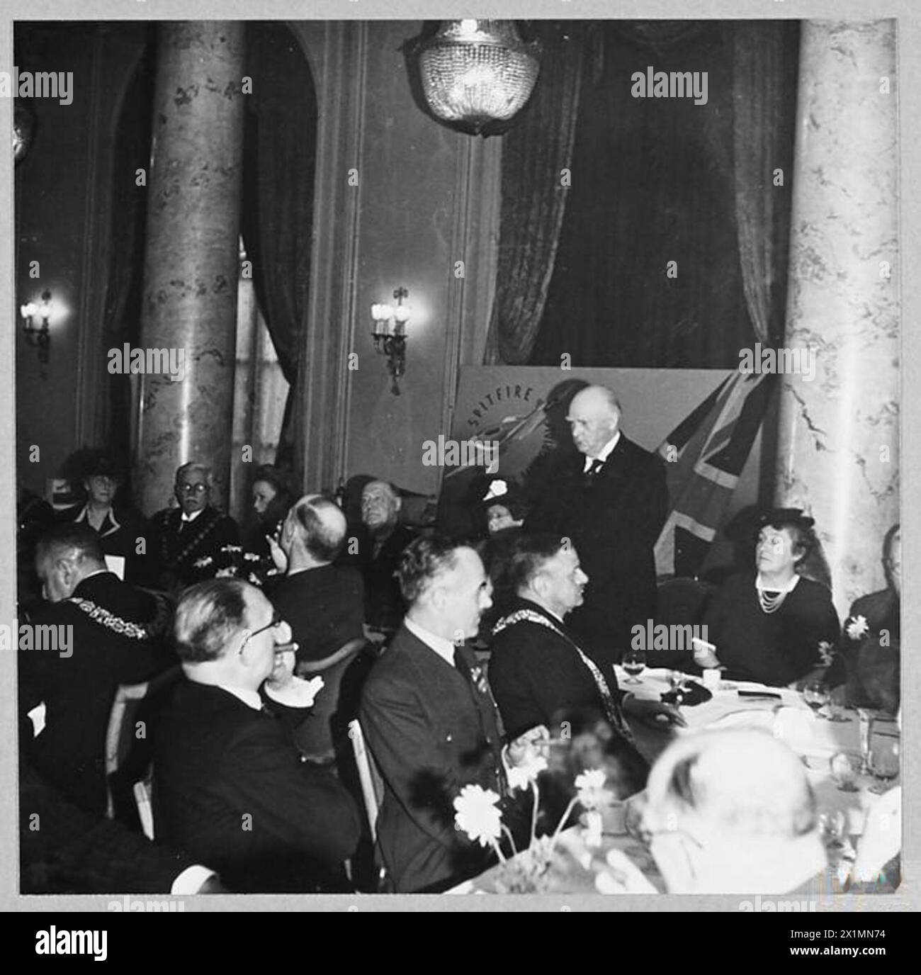 SPITFIRE-MITCHELL MEMORIAL LUNCHEON - 13369 Picture (issued 1944) shows ...