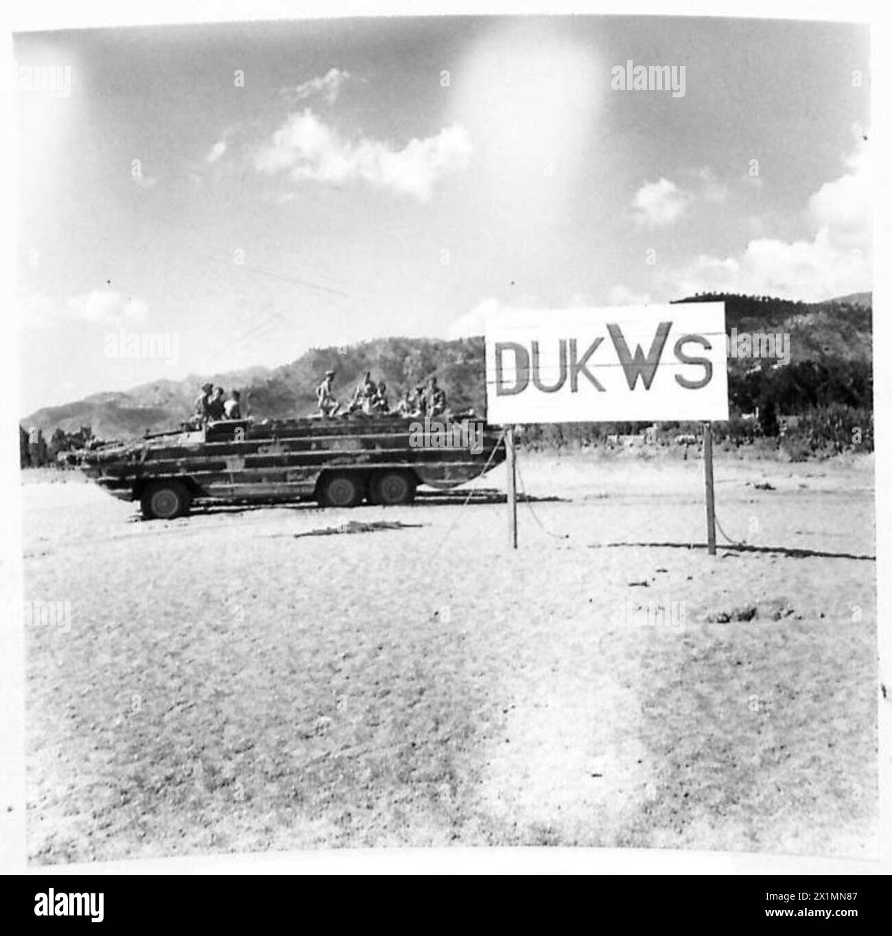 AMPHIBIANS KEEP OUR INVADING FORCES SUPPLIED - A loaded 'duck' going ...