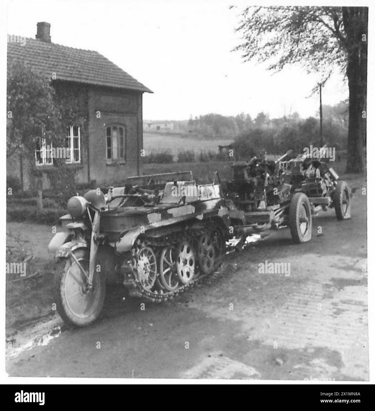 11TH ARMOURED DIVISION IN LUBECK - German flack guns drawn by a ...