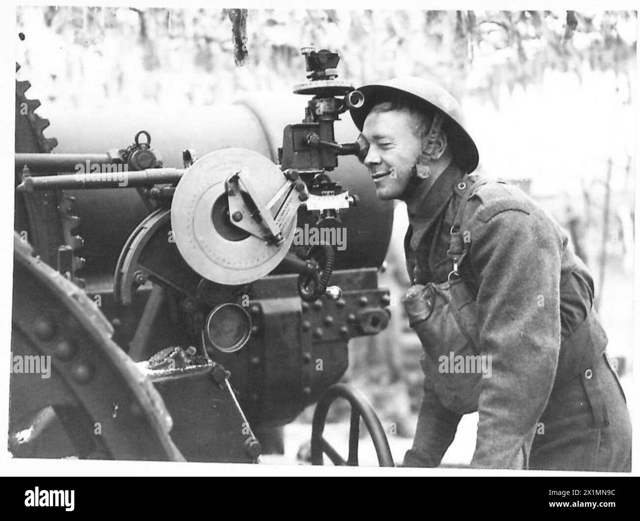 Gunner Michael Lawlor of the British Army performing artillery duties ...