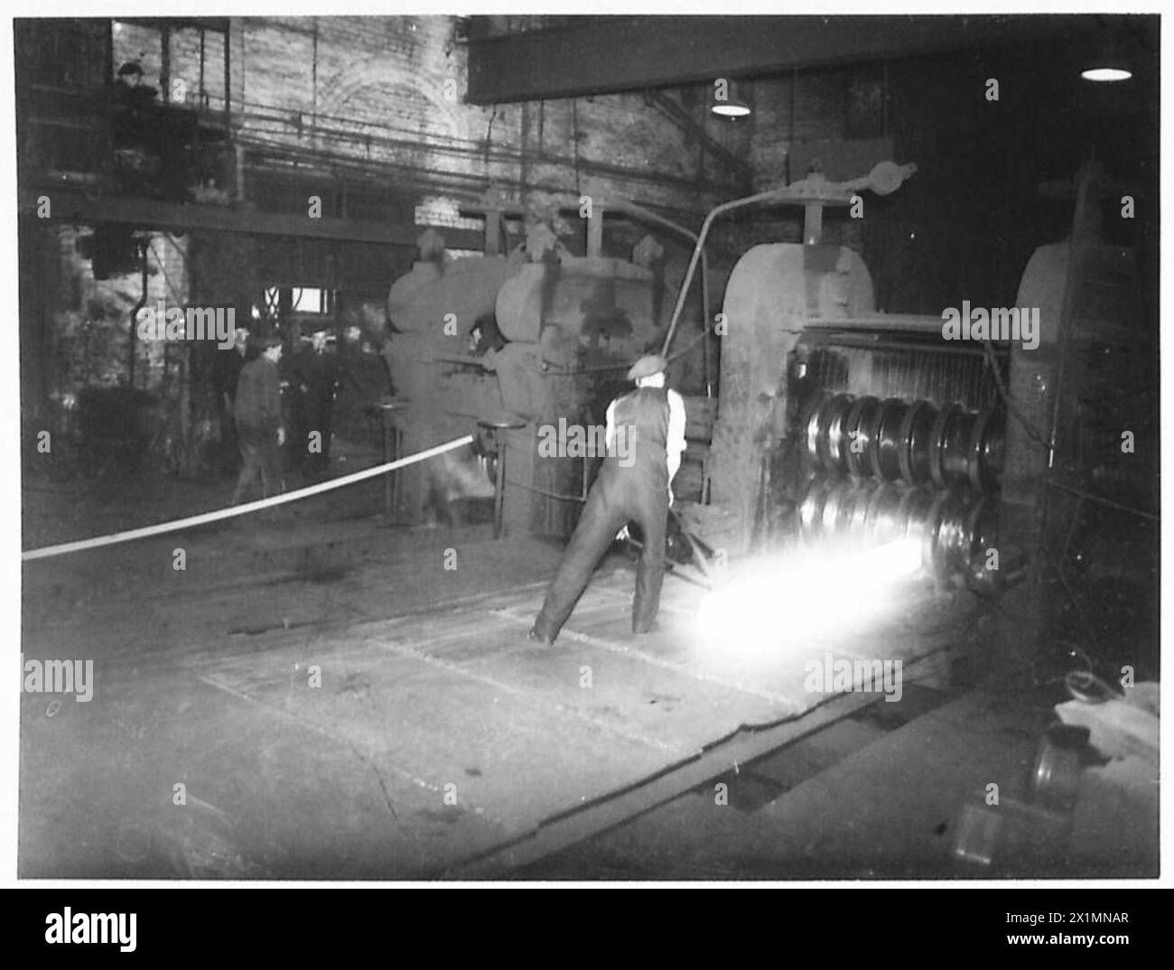 Steel billets for tank parts are produced from recycled tin, showing ...