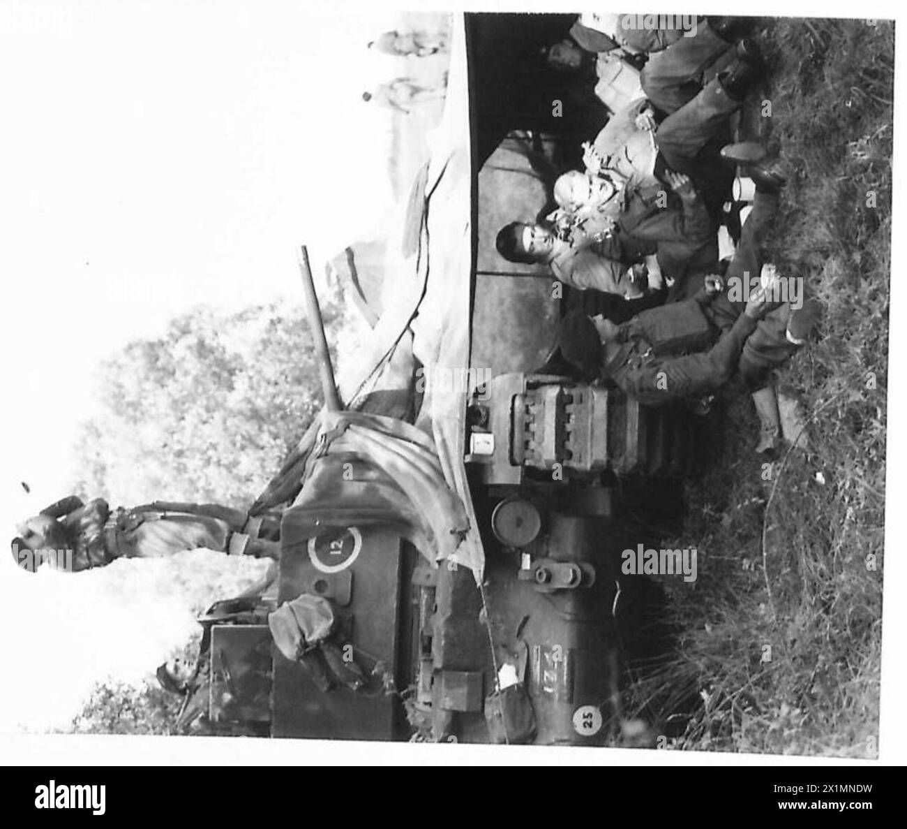 AN EXERCISE IN KENT - Matilda Mark II "I" tank hidden under a tree ...