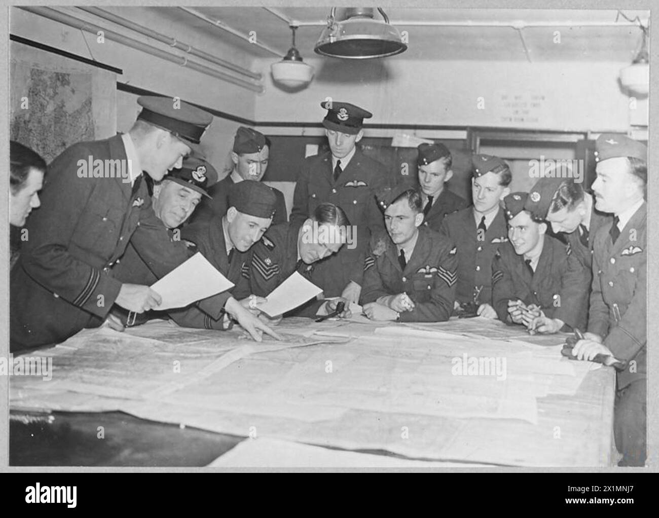 (For caption see CH.254) - Bomber crews receive detailed target ...