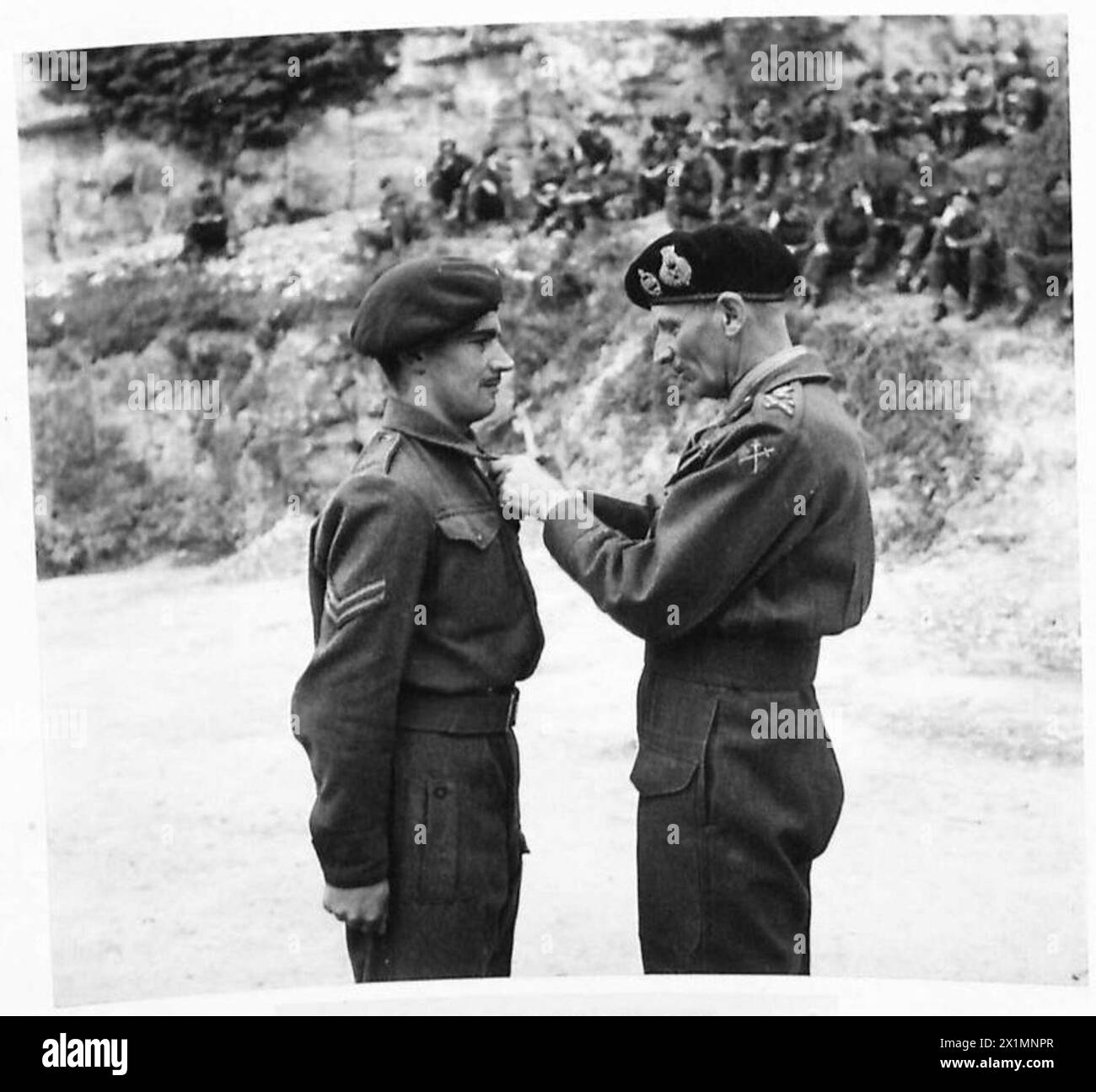 Corporal D.A. Osborne of No. 3 Commando, 1st SS Brigade, received the ...