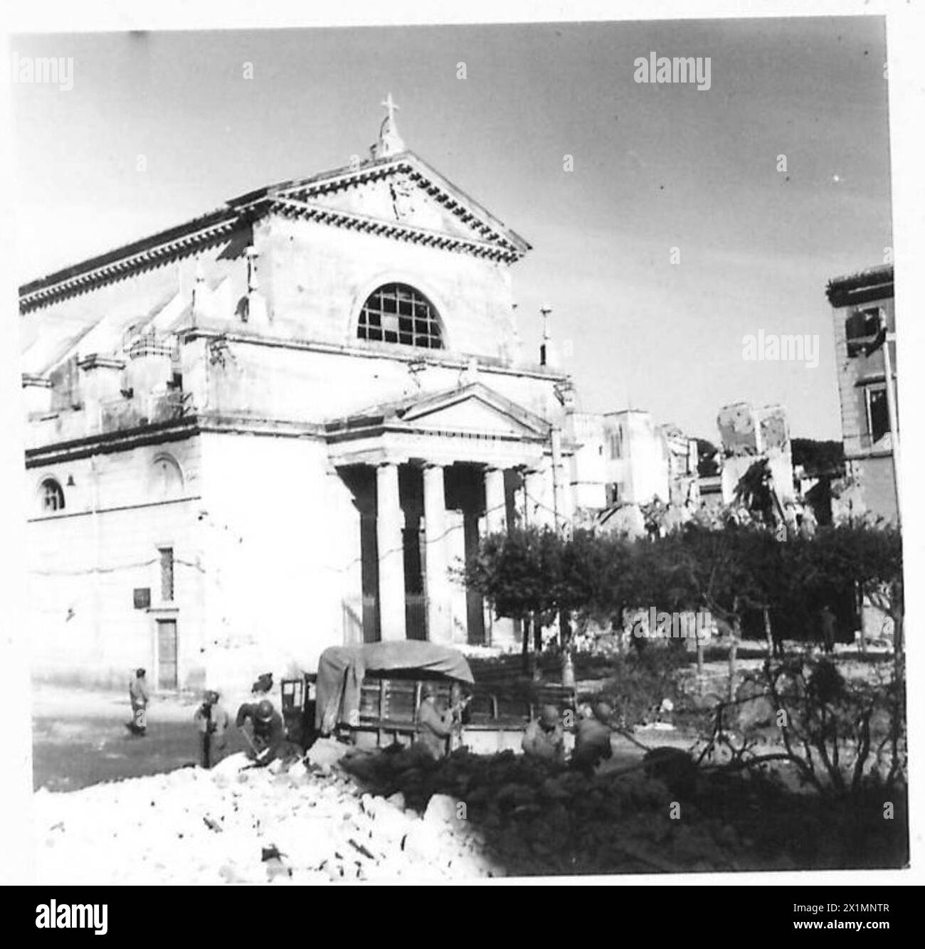 A church in the main square of Anzio remains intact amid surrounding ...