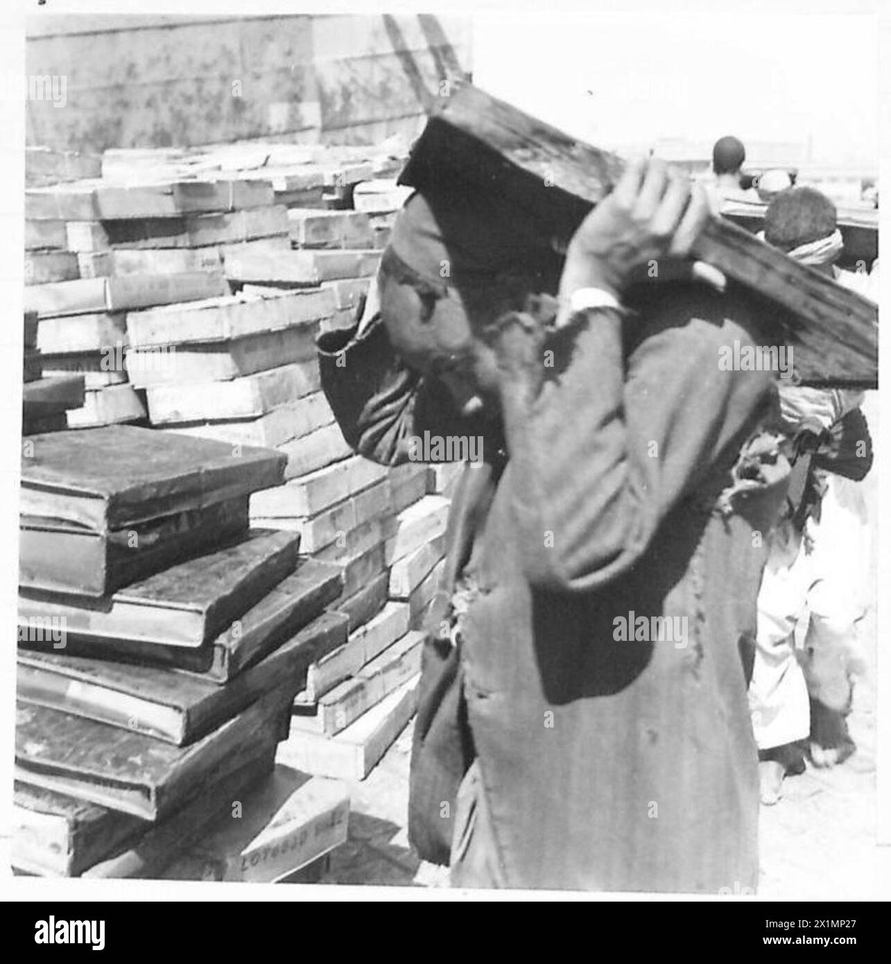 THE M.E.F. MANUFACTURERS ITS OWN PETROL TINS - This pictures shows the two kinds of packing, the ...