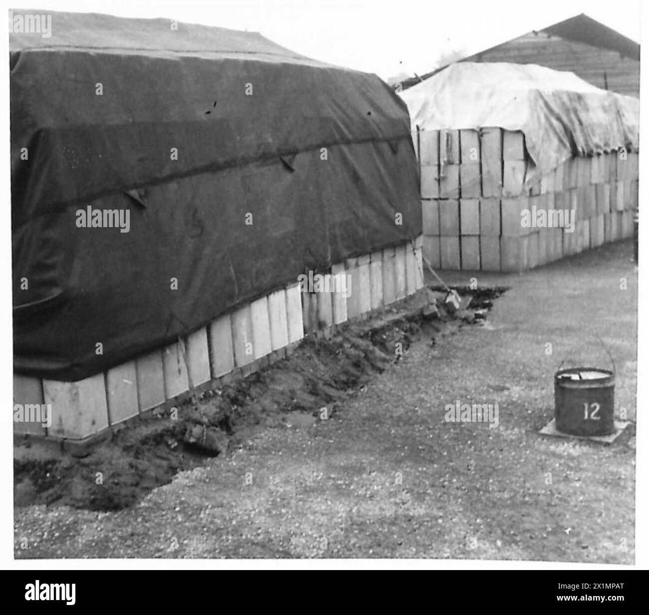 At a British Army petrol depot, one stack is correctly built on bricks ...