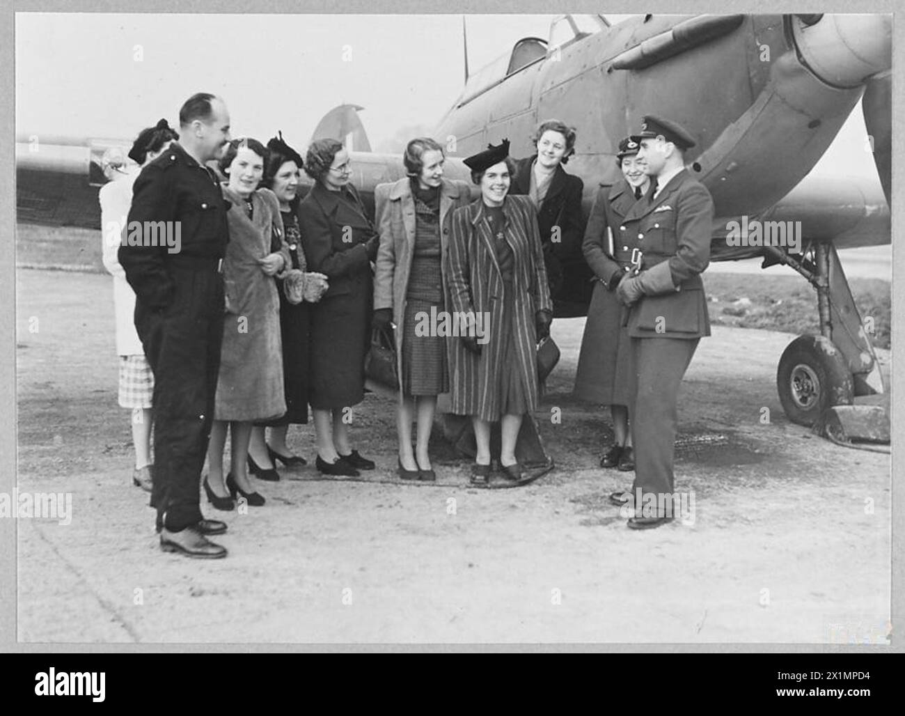 BEST ATTENDANCE GIRLS - Factory girls visit R.A.F. Fighter Station ...
