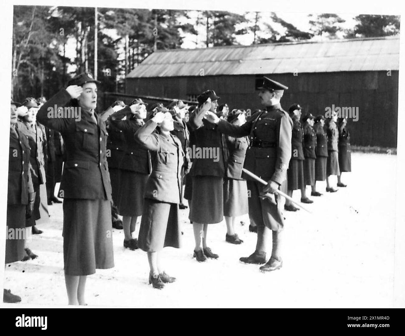 At the A.T.S. Driving School, a sergeant major instructs female ...