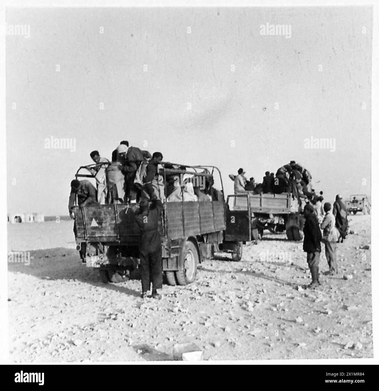 PICTURES TAKEN IN THE WESTERN DESERT - Loaded lorries of refugees and ...