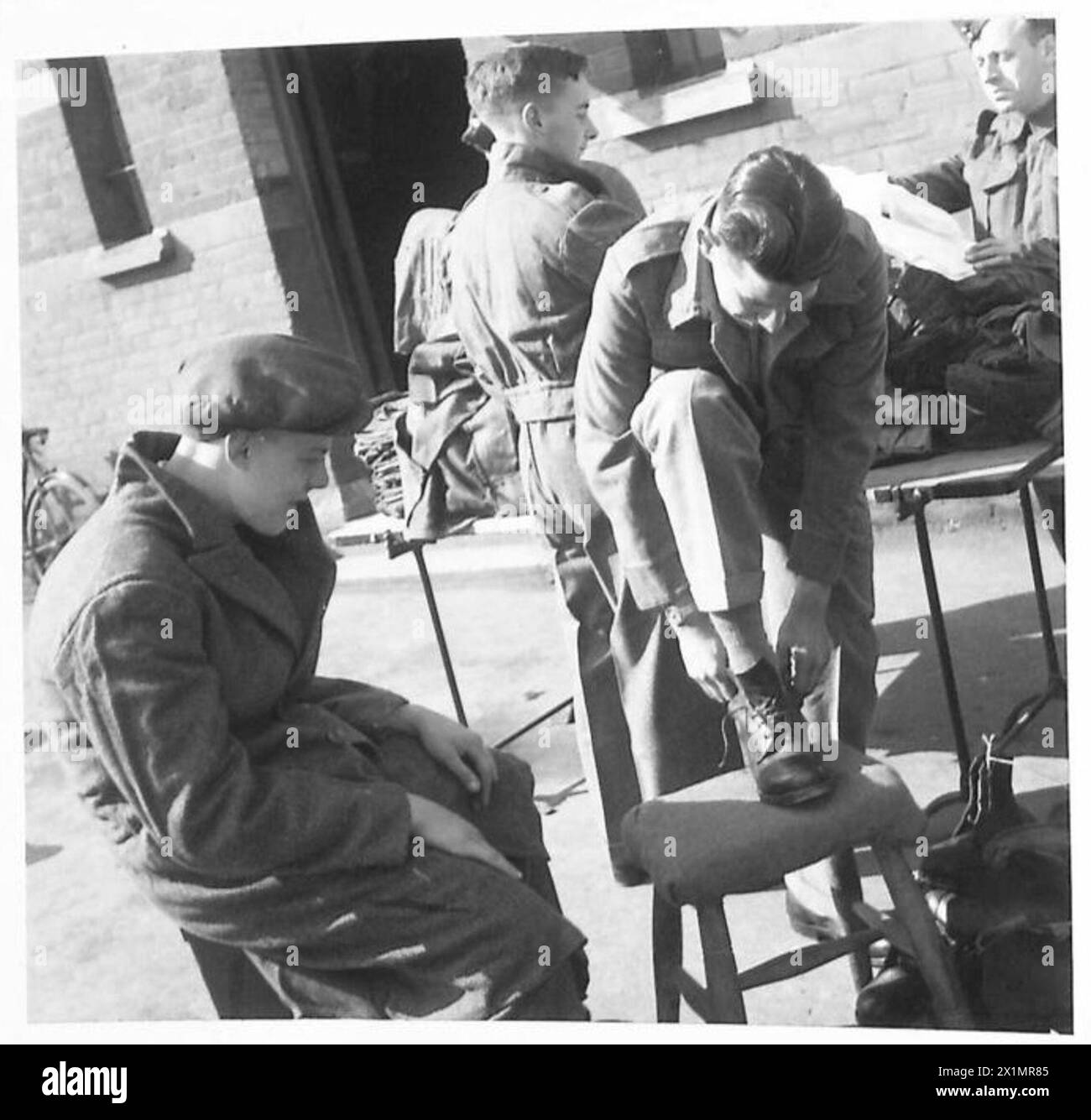 INFANTRY TRAINING CENTRE (continued) - Putting on their new uniforms ...