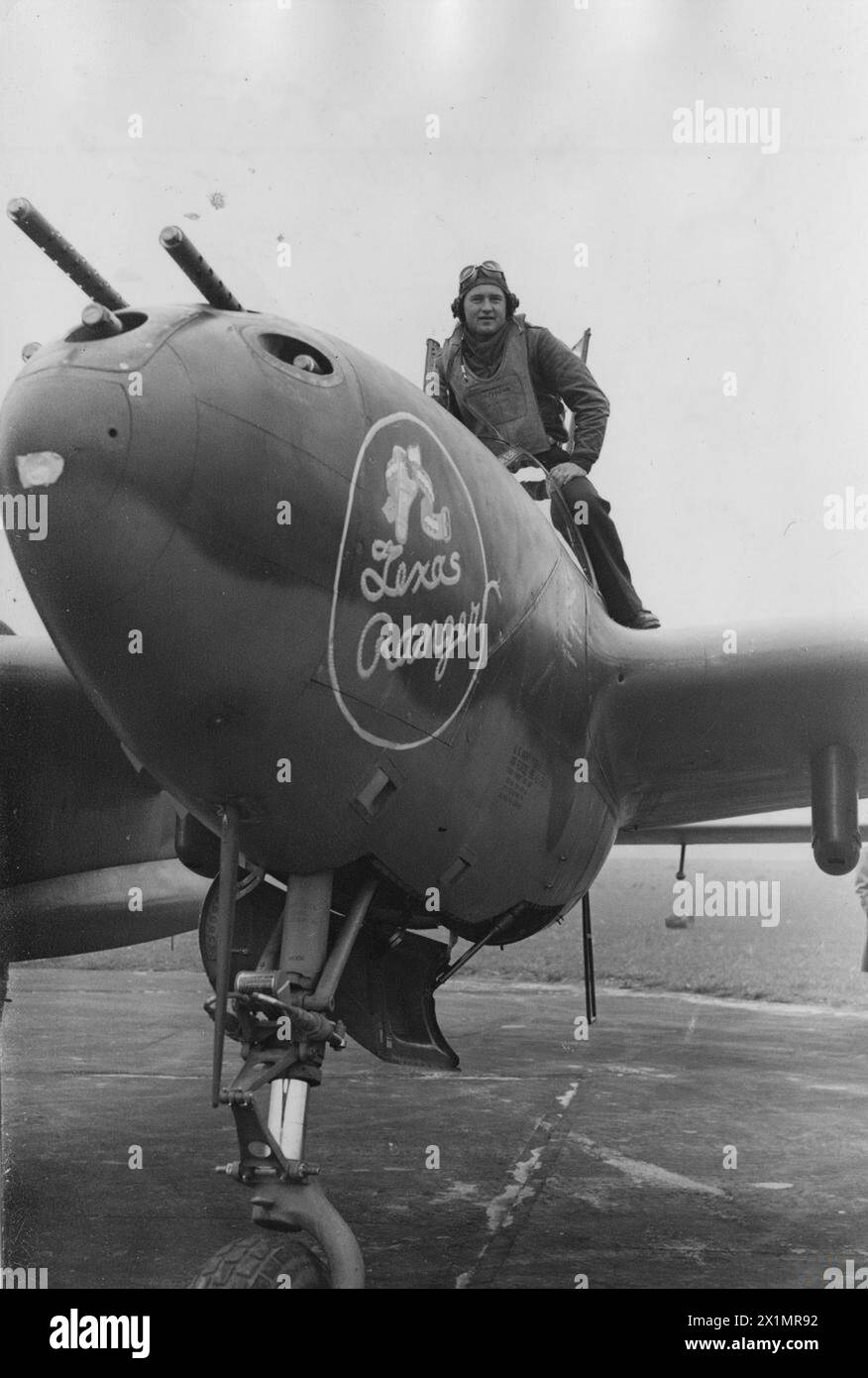 Captain Mark K. Shipman of the 55th Fighter Group sits on a P-38 ...