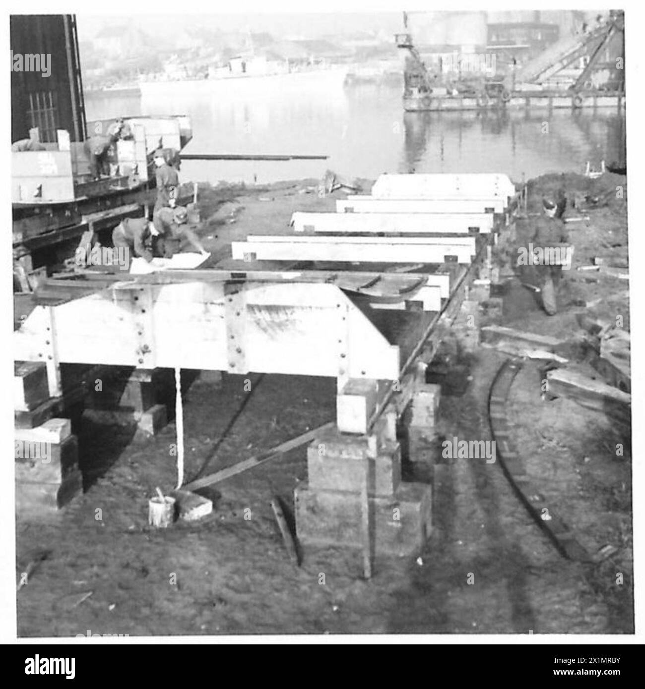 Photograph shows Royal Engineers assembling a 60-foot barge on a cradle ...