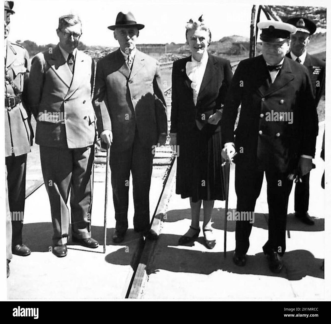 MR.CHURCHILL SHOWS COLONEL STIMPSON OUR DEFENCES - Left to right:- Sir ...