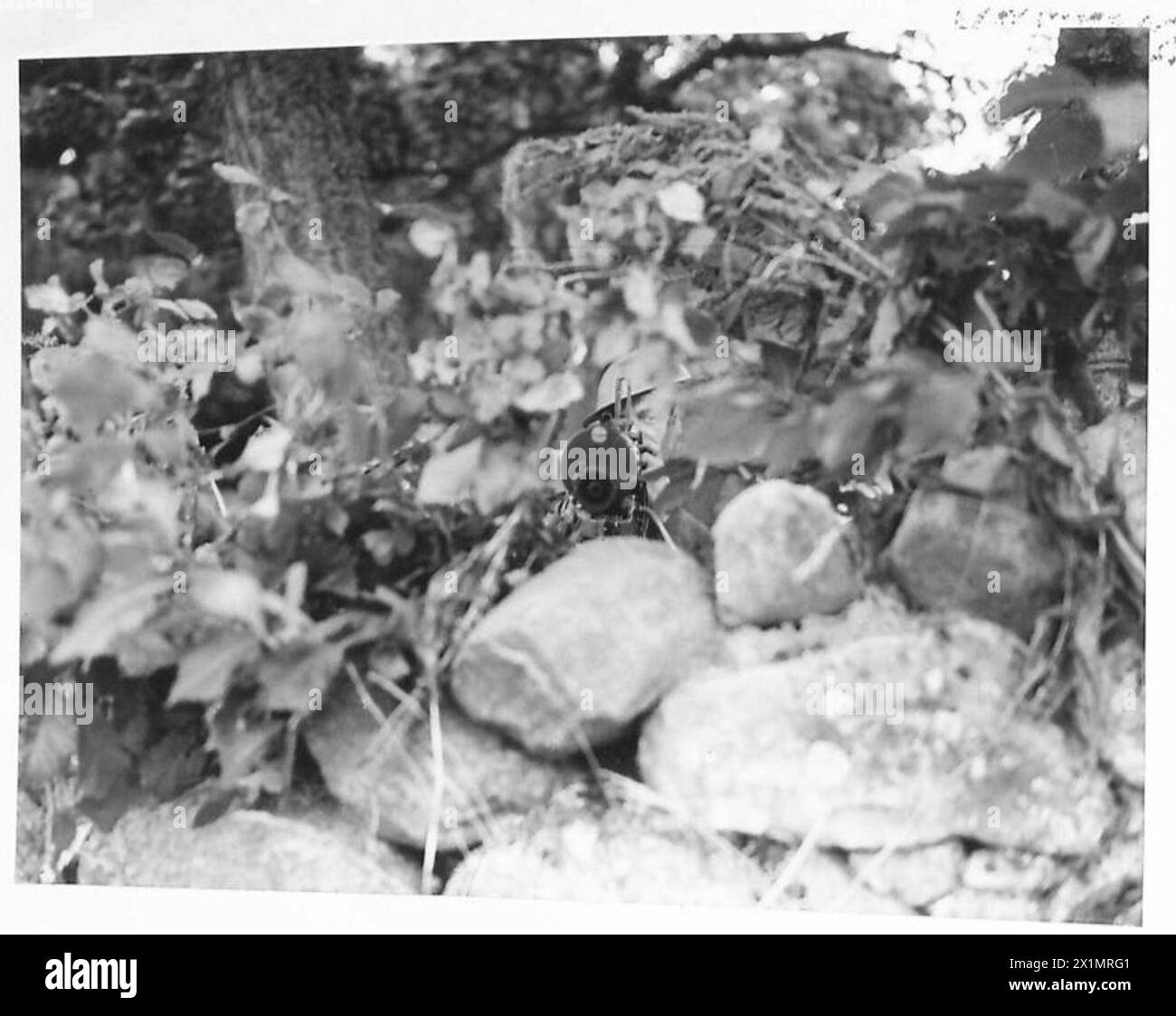 HOME GUARD EXERCISE - A camouflaged machine gun post opens fire on the ...