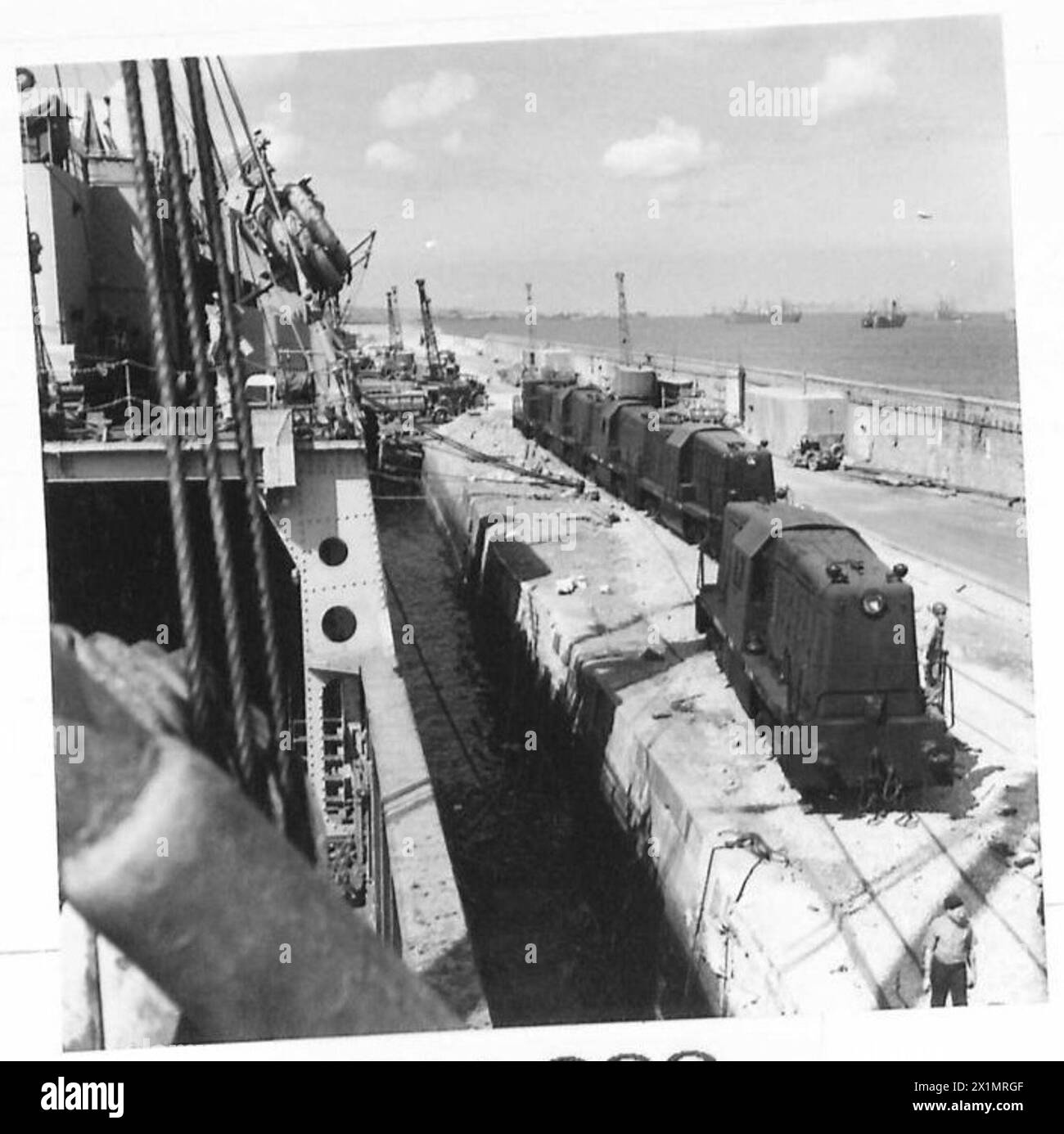 PHOTOGRAPHS OF PREFABRICATED PORT, ETC. - Diesel locos offloaded from ...