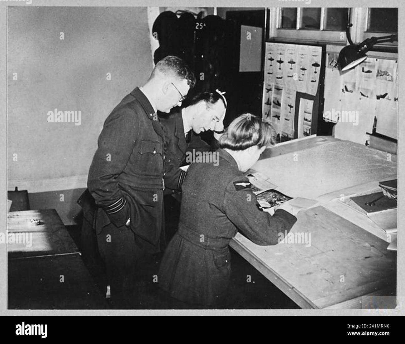 A W.A.A.F. PREPARED TARGET MAP FOR R.A.F. RAID - W.A.A.F. map clerks ...