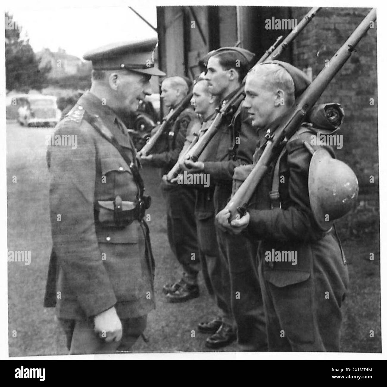 PRIME MINISTER VISITS DEFENCES - General Sir John Dill chatting to a ...