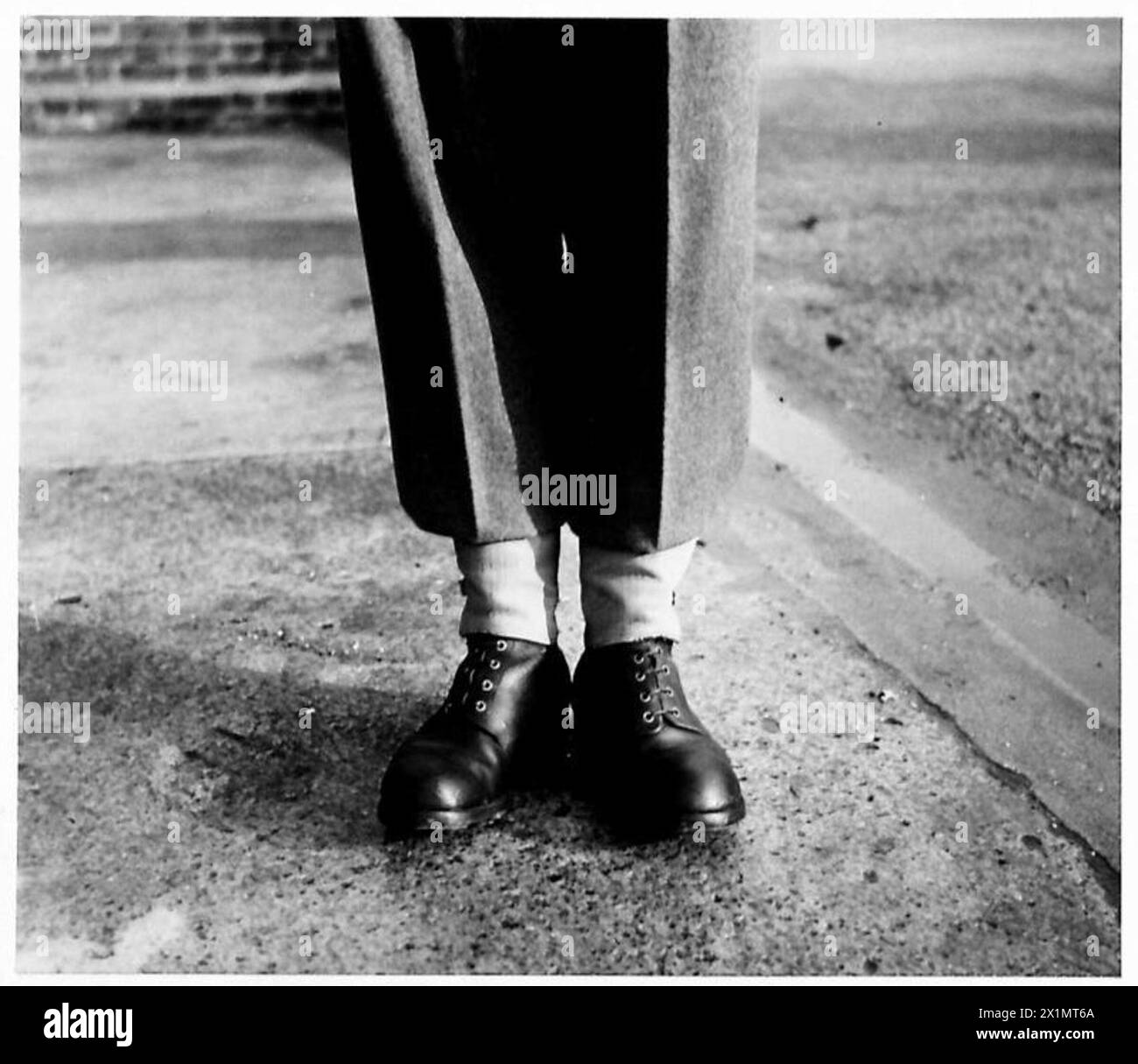 Wears the trousers Black and White Stock Photos & Images - Alamy