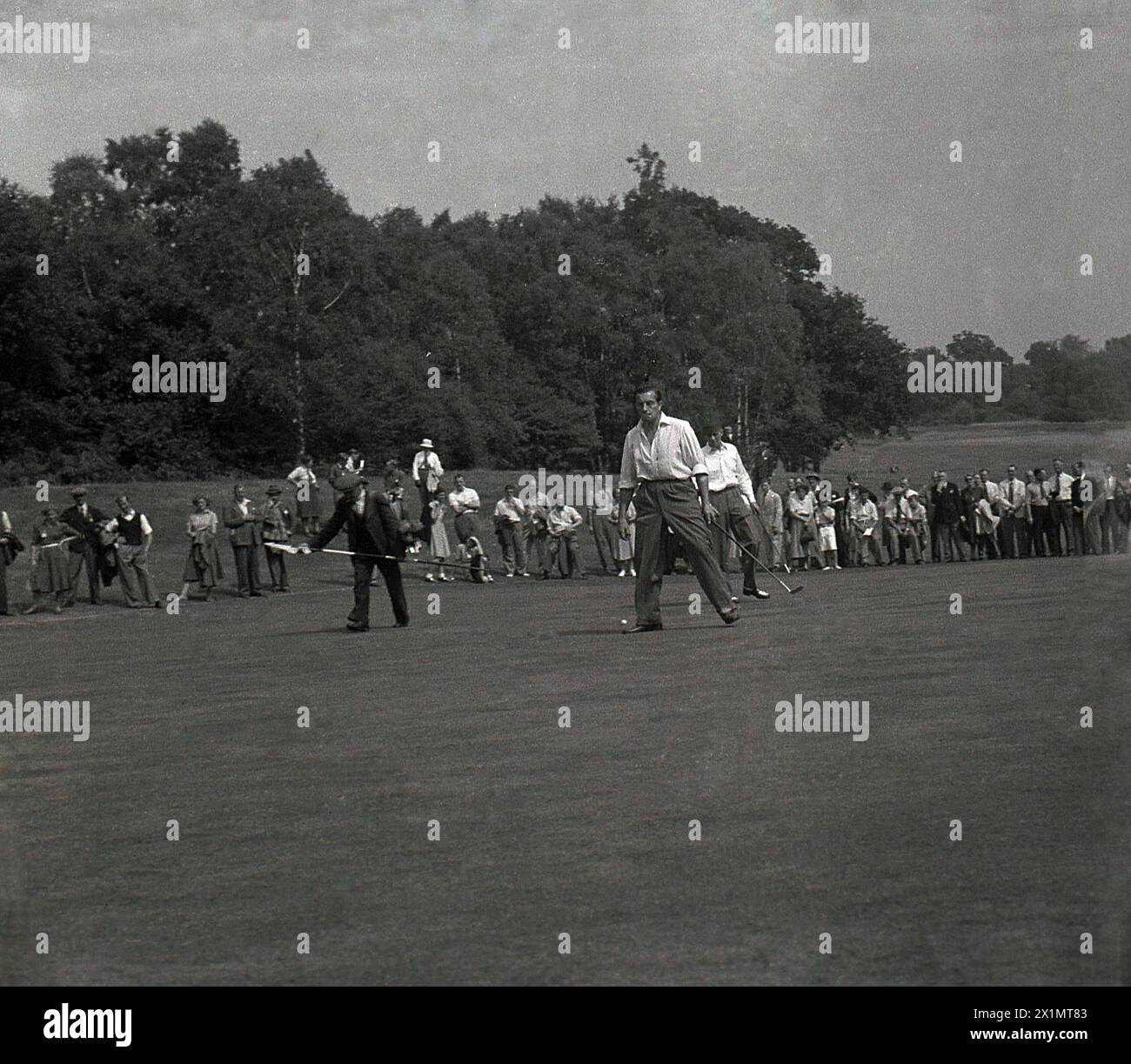 1950s men golfing hi-res stock photography and images - Alamy