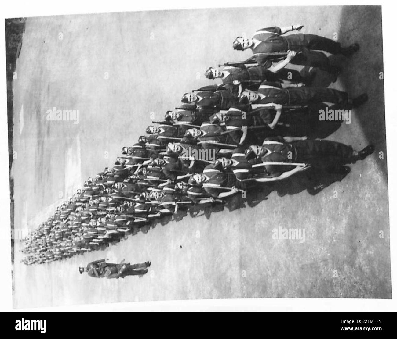 ALL FROM ONE FIRM - The men marching on the barrack square , British ...