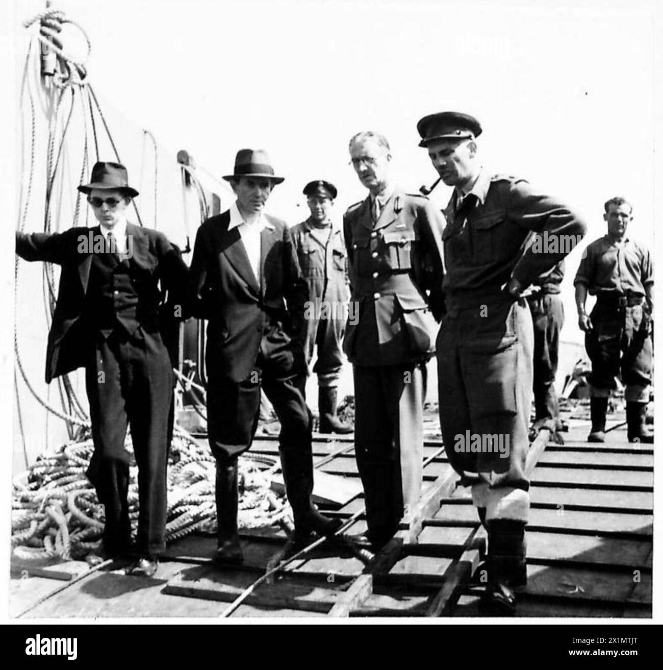 SPECIAL ASSIGNMENT FOR D.TN. - Right to left: Major Carline, Brigadier ...