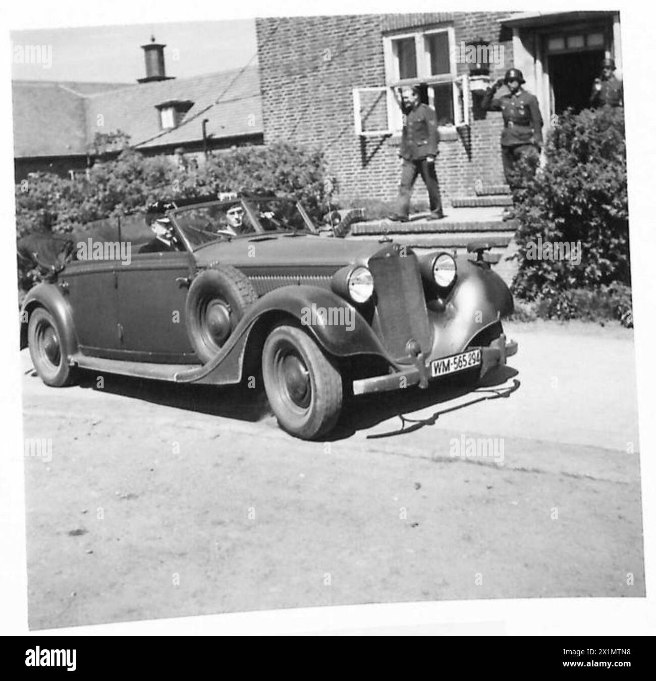 Admiral Karl Doenitz departs from the German High Command Headquarters ...
