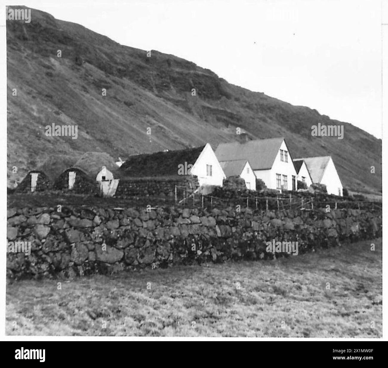 A typical Icelandic farm is shown where British Army troops are ...