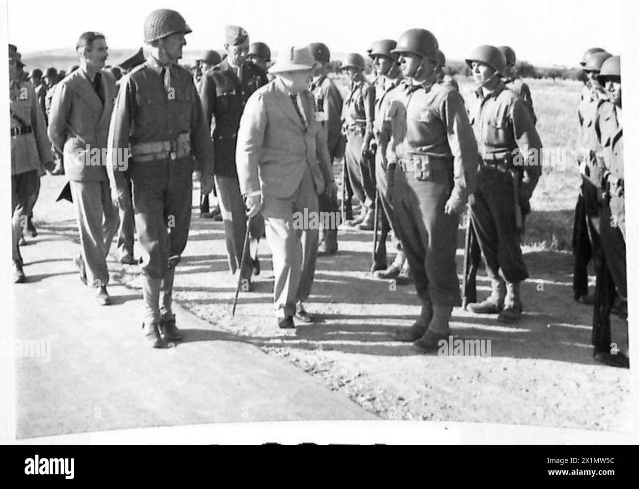 Mr. Churchill inspects American troops of the 1st Battalion, 168 ...