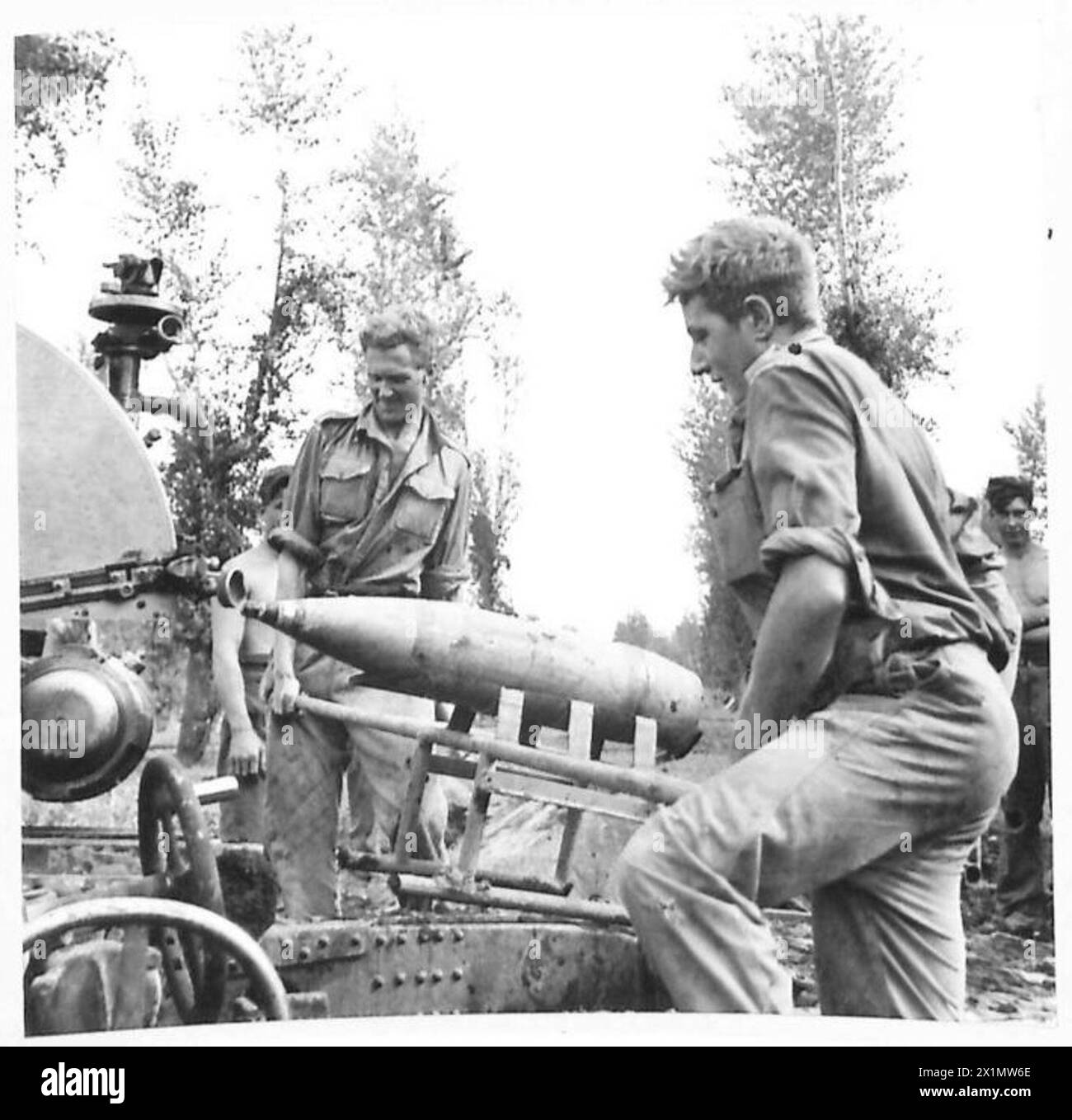 BRITISH 4.5 and 7.2 GUNS IN ACTION! - Loading a 200-pound shell into ...