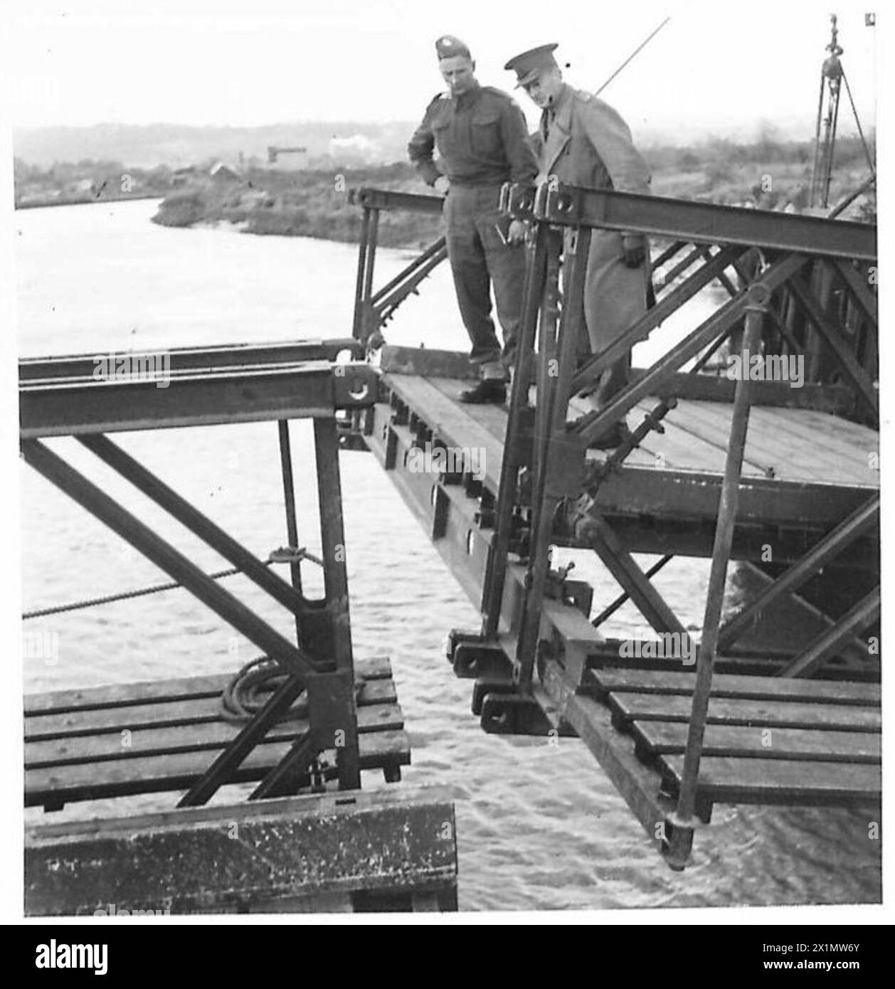British Army engineers construct a Bailey Bridge to facilitate troop ...