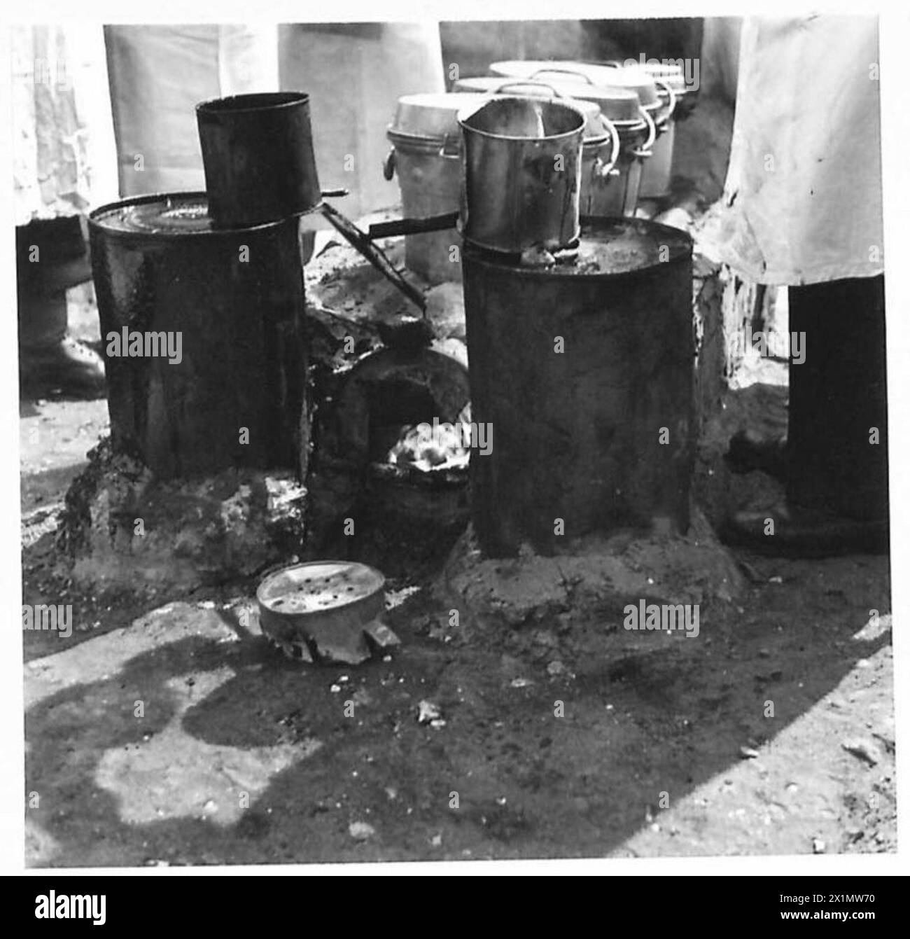 ARMY COOKING EQUIPMENT - Field improvised cooker using oil and water as ...