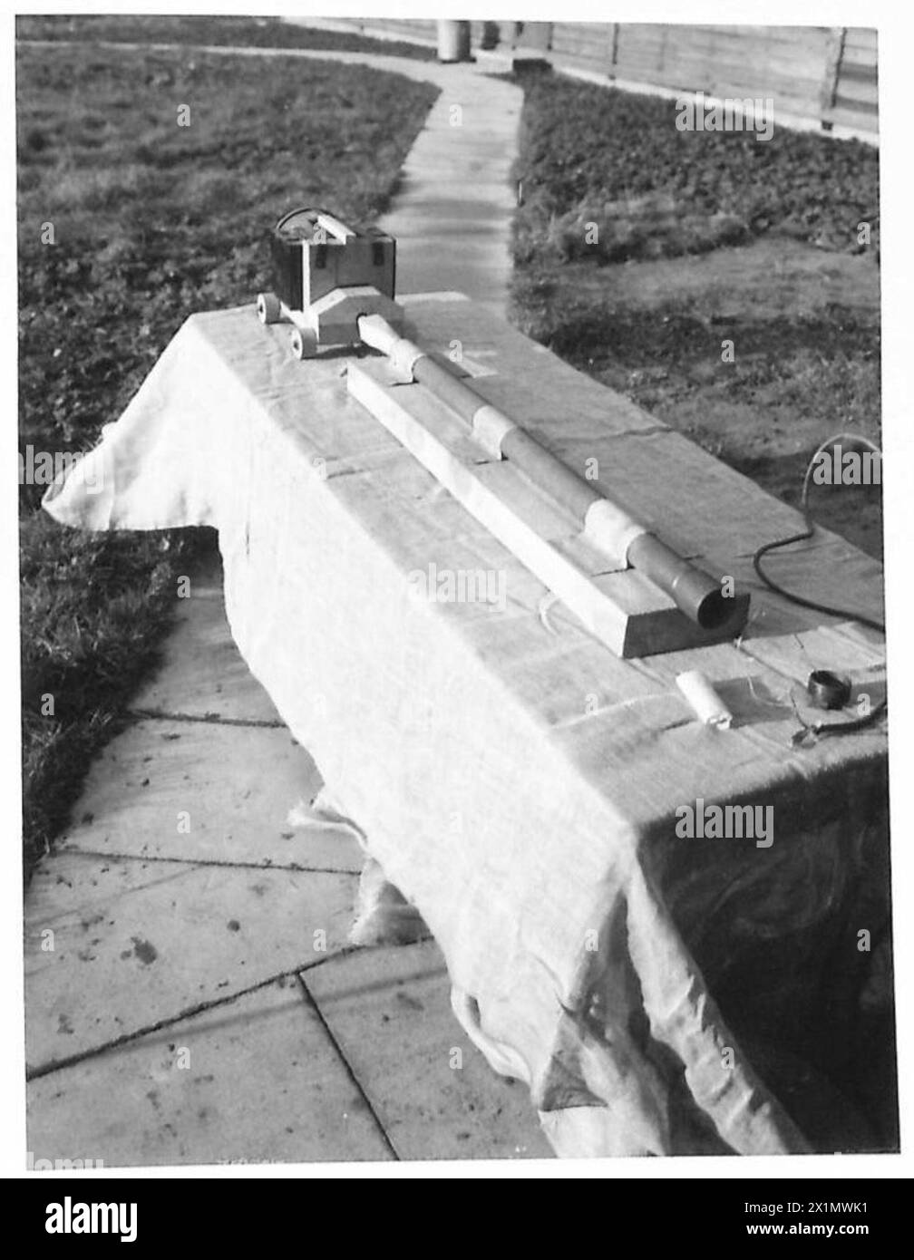 Experimental anti-tank torpedoes are displayed on trolleys near Chester ...