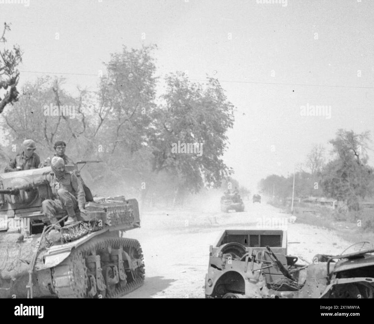 THE BRITISH ARMY IN BURMA 1945 - A Stuart tank, crewed by members of ...